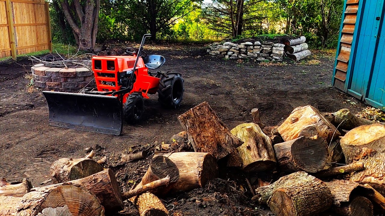 Pushing free wood up to my Log Splitting Area w/ Sears Custom 10XL ...
