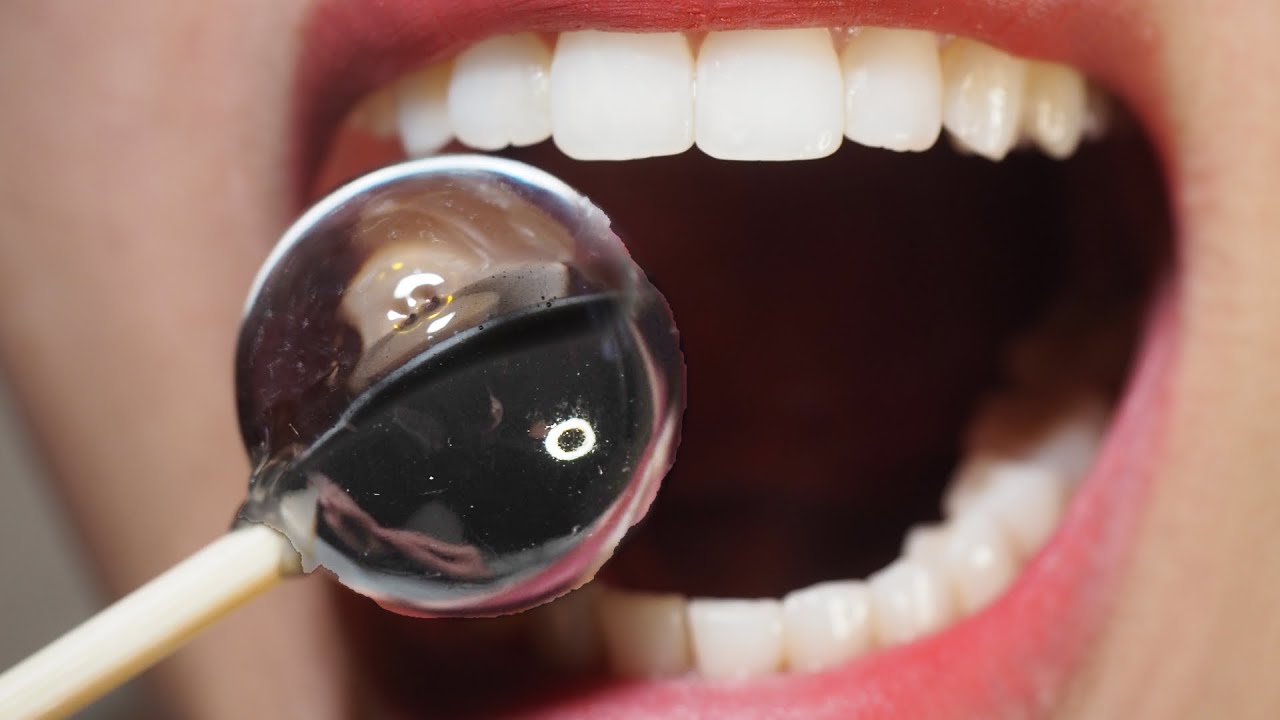 Hard Candy Crush and chew ASMR. Camera close up. Chewed food warning ...