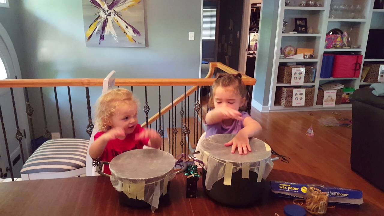 Playing homemade bongos - YouTube