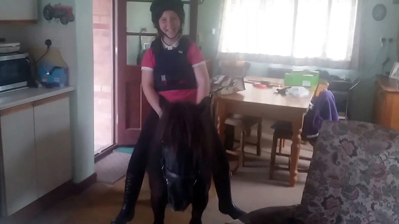 Pony riding in house - YouTube