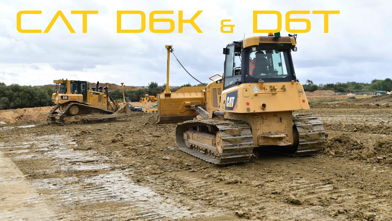 CAT D6T and D6K spreading material on a project in Corby - YouTube