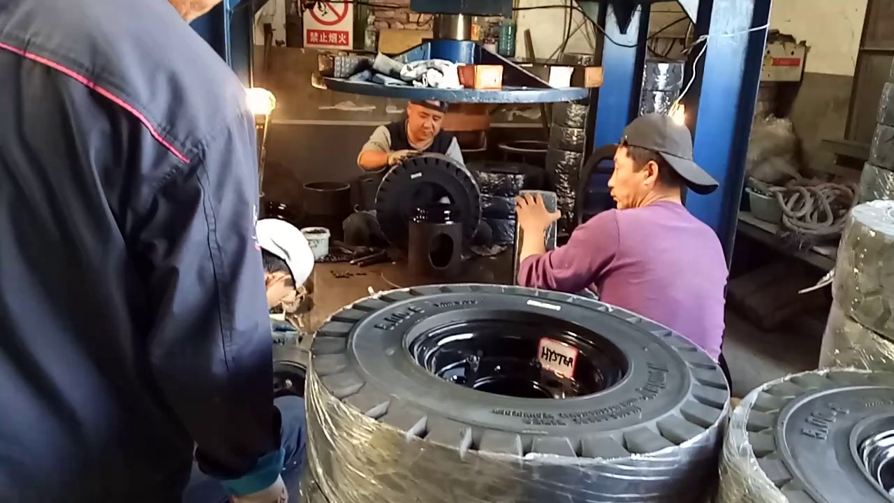 press solid tires 4.00-8 with split rims - YouTube