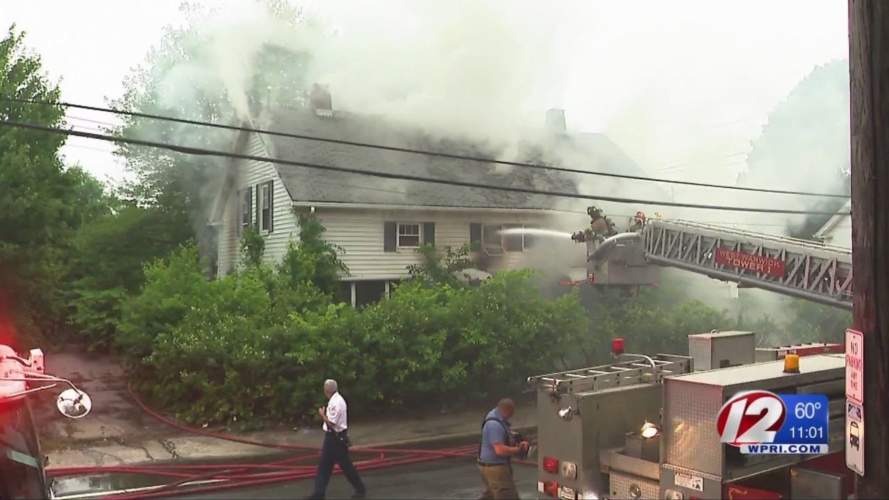 Firefighters battle house fire in West Warwick - YouTube