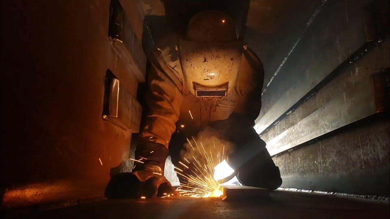 Welding inside a spud tube - YouTube