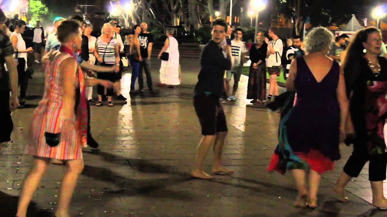 young hearts dancing to serbian gypsy buskers on the street - YouTube