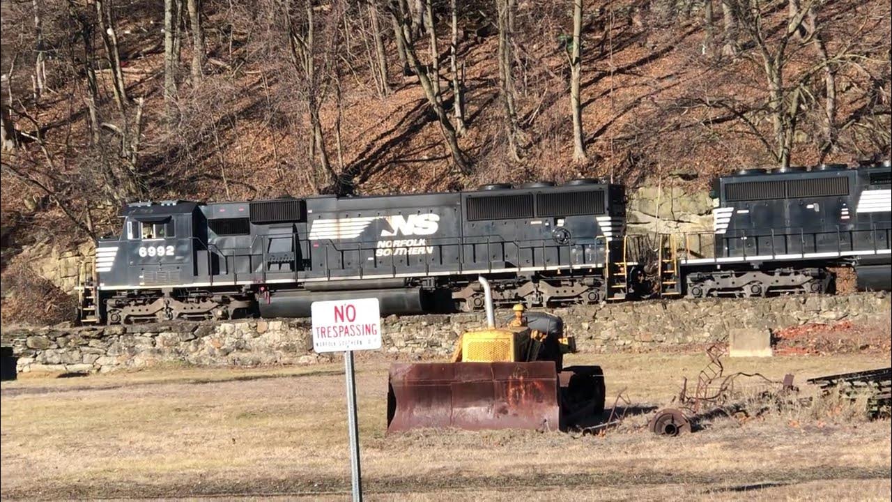 SD60E Leads NS H65 & coming to a stop to wait for NS 18N - YouTube