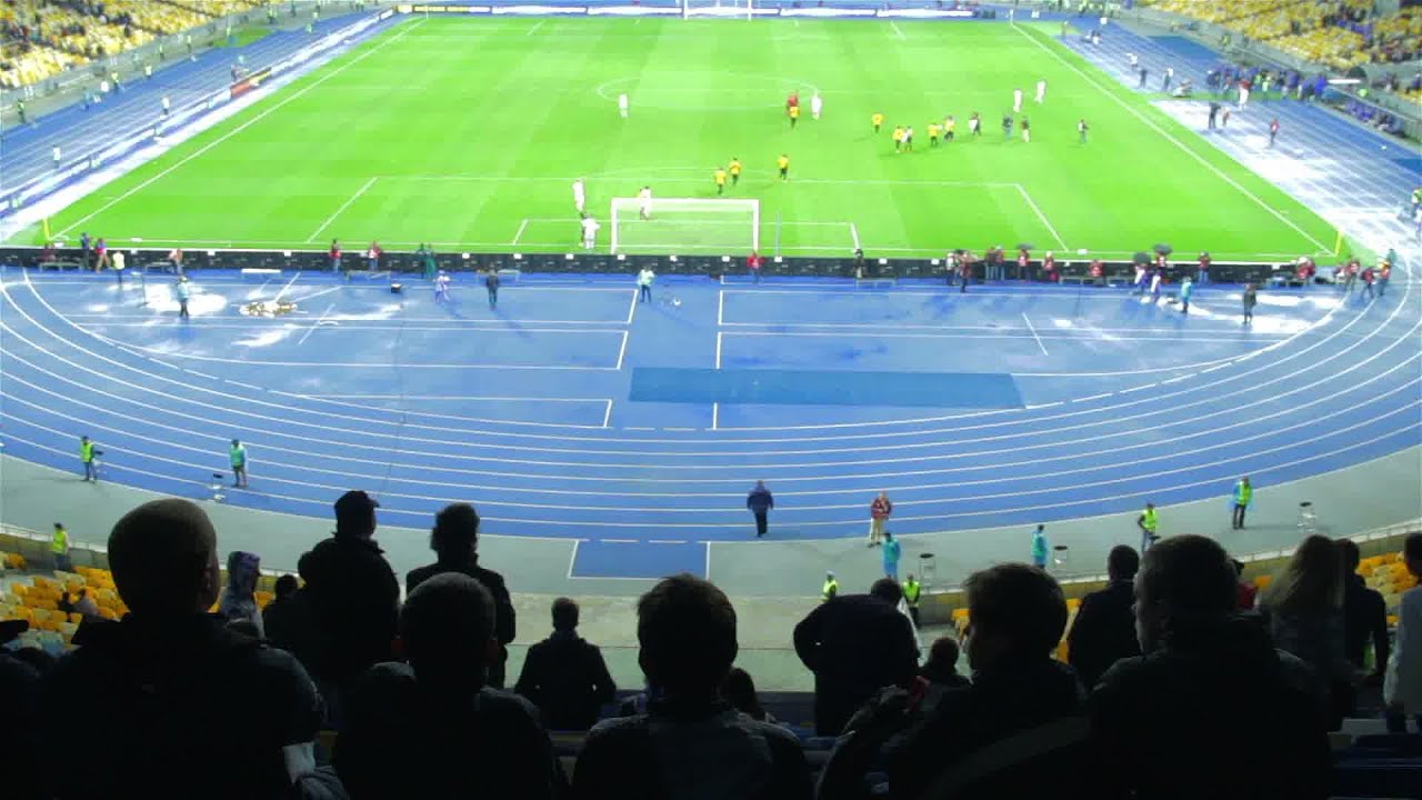 Lost team fans stunned after defeat, winners celebrate, football. Stock ...