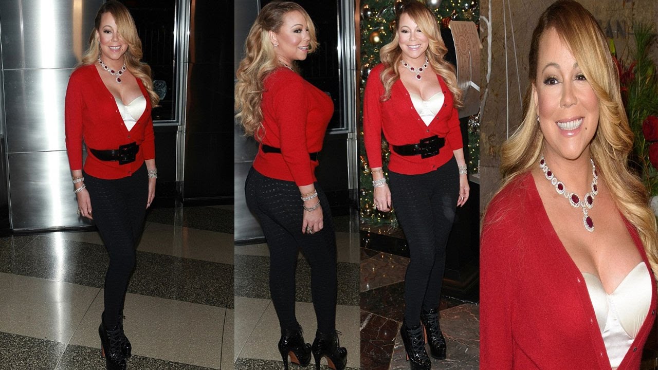 Mariah Carey Flashes her Bust in Santa Esque Cardigan - YouTube