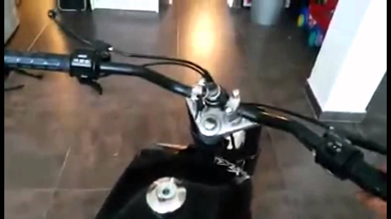 Suzuki ax 100 rectificada a 115 escape macondo - YouTube