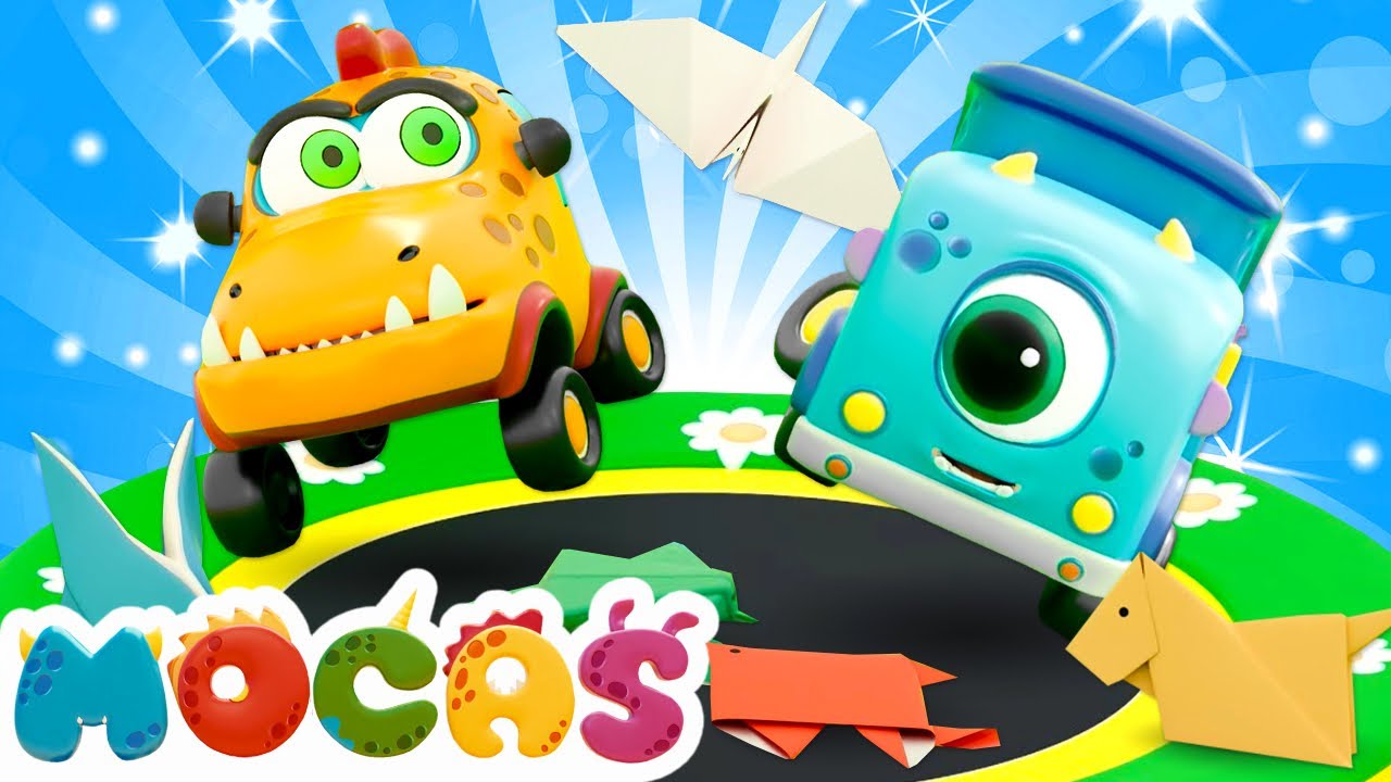 Little monster cars make origami. Toy cars race in the sandbox. Funny ...
