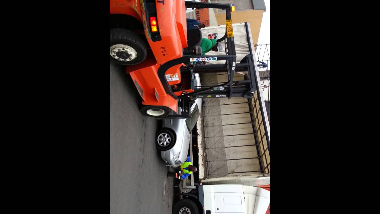 Using a forklift to offload a vehicle - YouTube