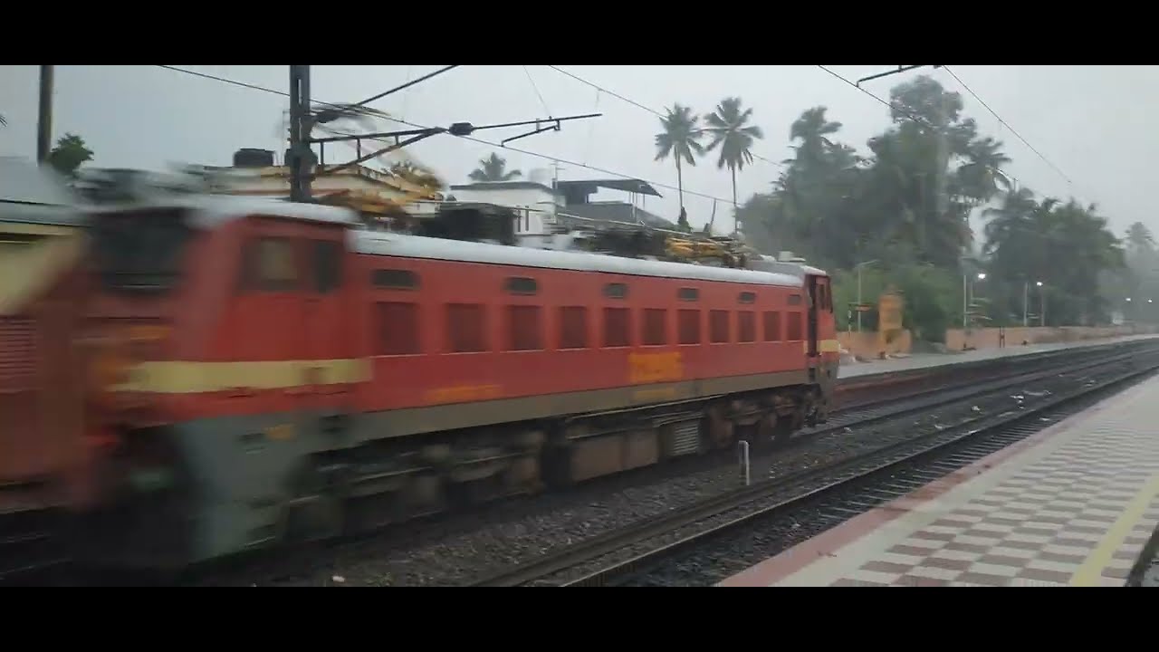 Kanyakumari Punalur express at pettah|monsoon - YouTube