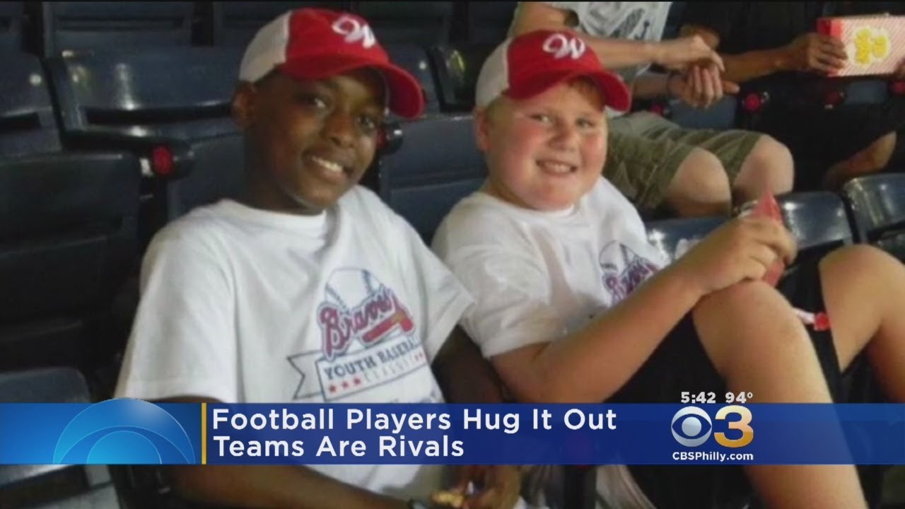 Rival Football Players Hug It Out After Game - YouTube