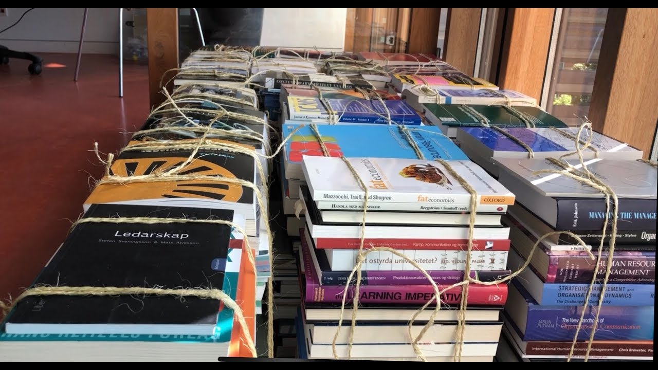 PhD students build a daybed about of discarded books - YouTube