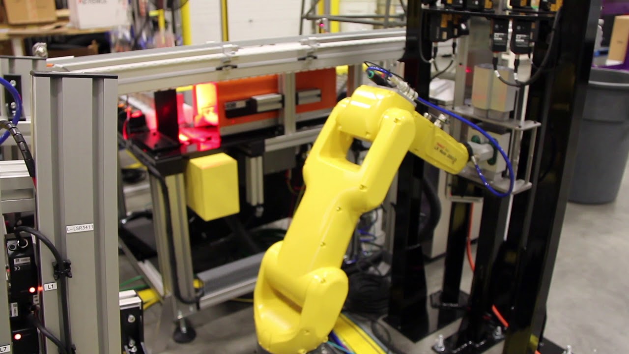 Weldon Solutions Automated Inspect and Pack Robotic Work Cell - YouTube