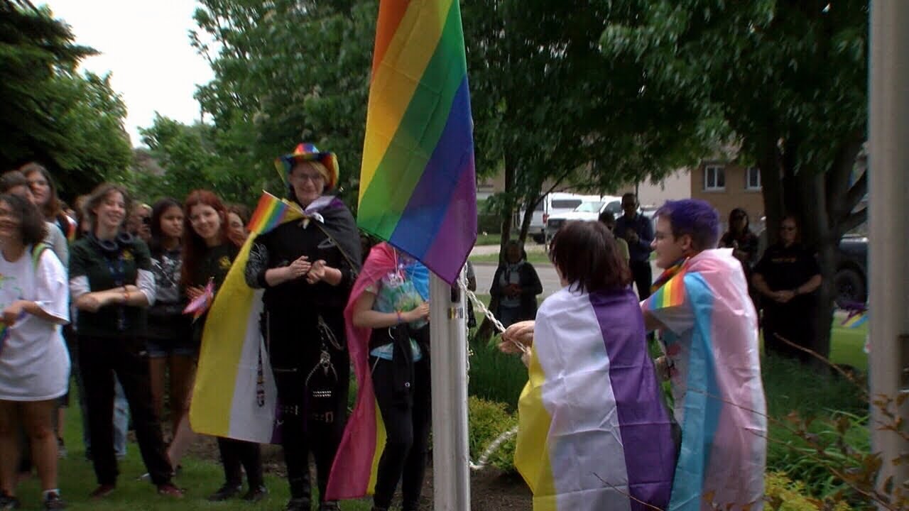 Pride flag raised at Catholic school board - YouTube