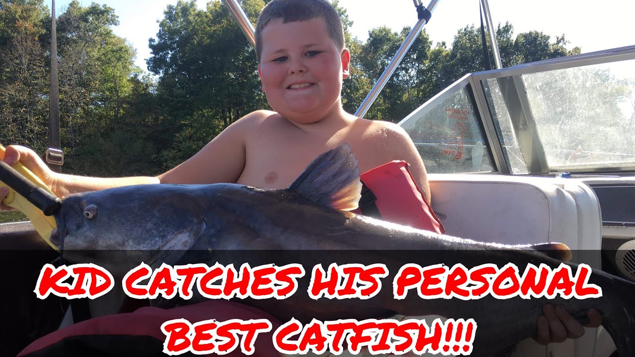 9 Year old Kid catches BIG BLUE CATFISH - YouTube
