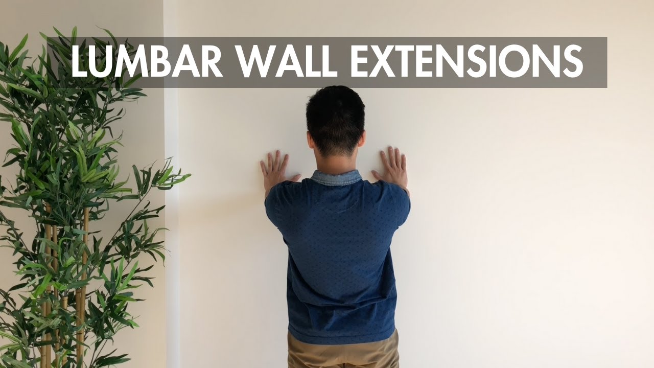 Standing lumbar extensions wall - YouTube