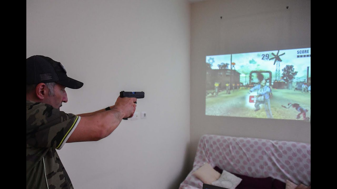 Simulatore di tiro con armi Laser Ammo Smokeless Range 2.0 - YouTube