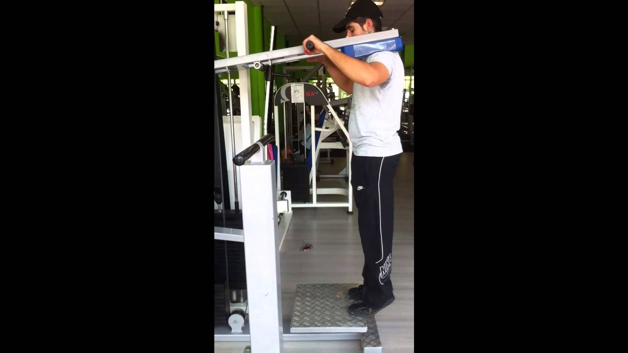 exercice musculation : mollet : mollets debout machine - YouTube