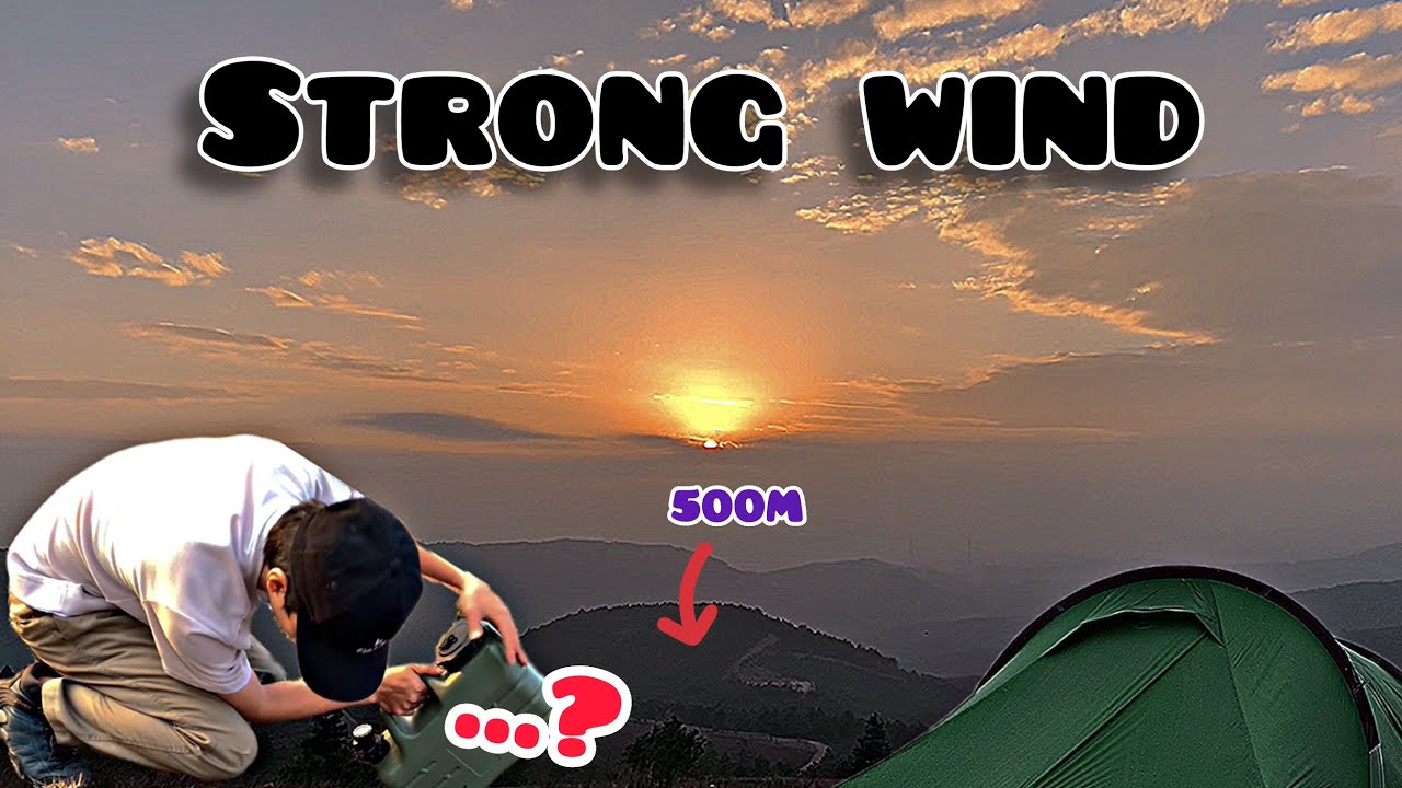 Camping alone on a 500m high mountain top, very strong wind and light ...