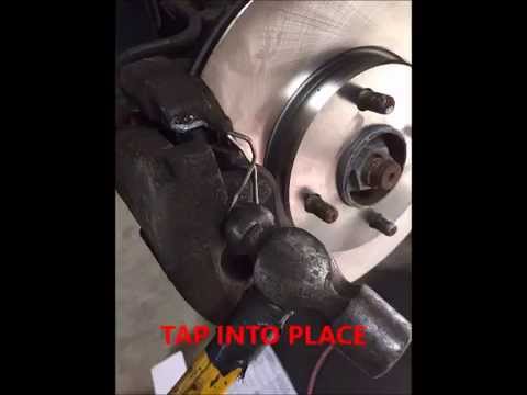 REPLACE FORD FOCUS FRONT BRAKE PADS AND ROTORS - YouTube