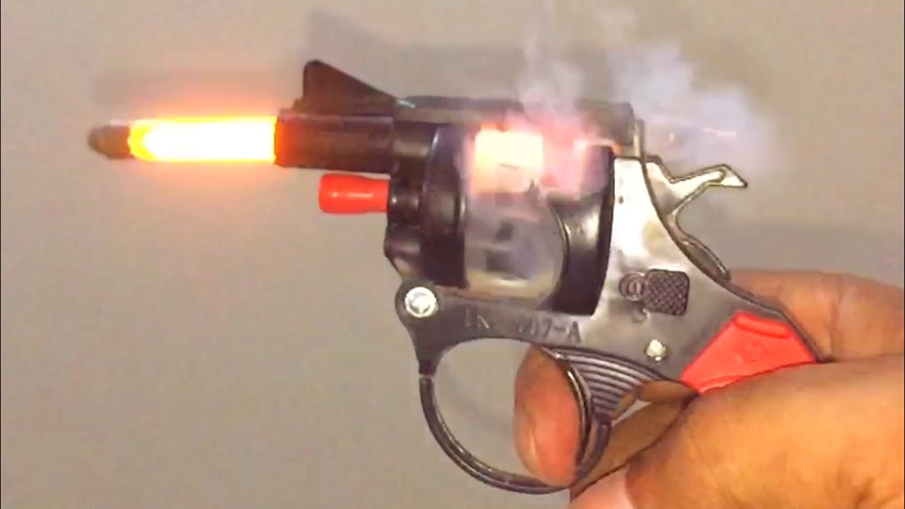 Plastic Revolver Slow Motion Views - YouTube