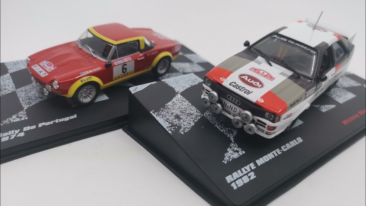 Rallye závodní automobily č. 51 Audi Quattro a č. 52 Fiat 134 Abarth ...