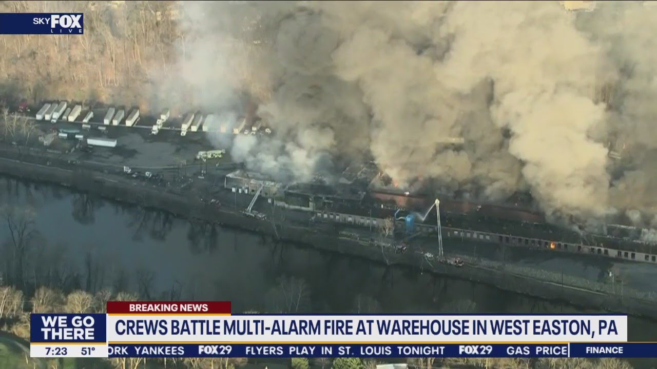 Crews battle multi-alarm fire at warehouse in West Easton - YouTube