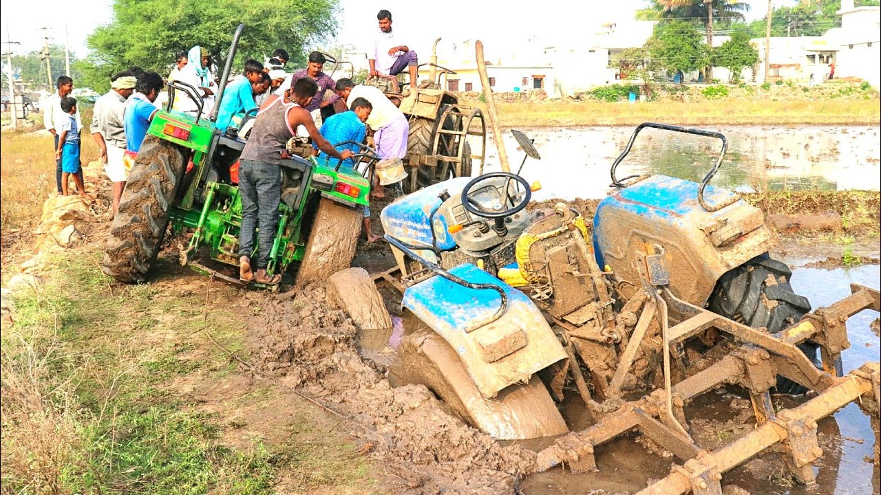 New holland and JohnDeere tractors stuck in mud Rescued by Mahindra ...