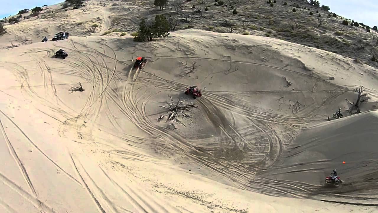 Fun in the sand at Little Sahara sand dunes RZR's and ATV's - YouTube