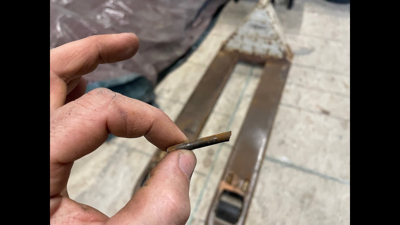 How to Replace a Pallet Jack Wheel - Pin Removal - YouTube