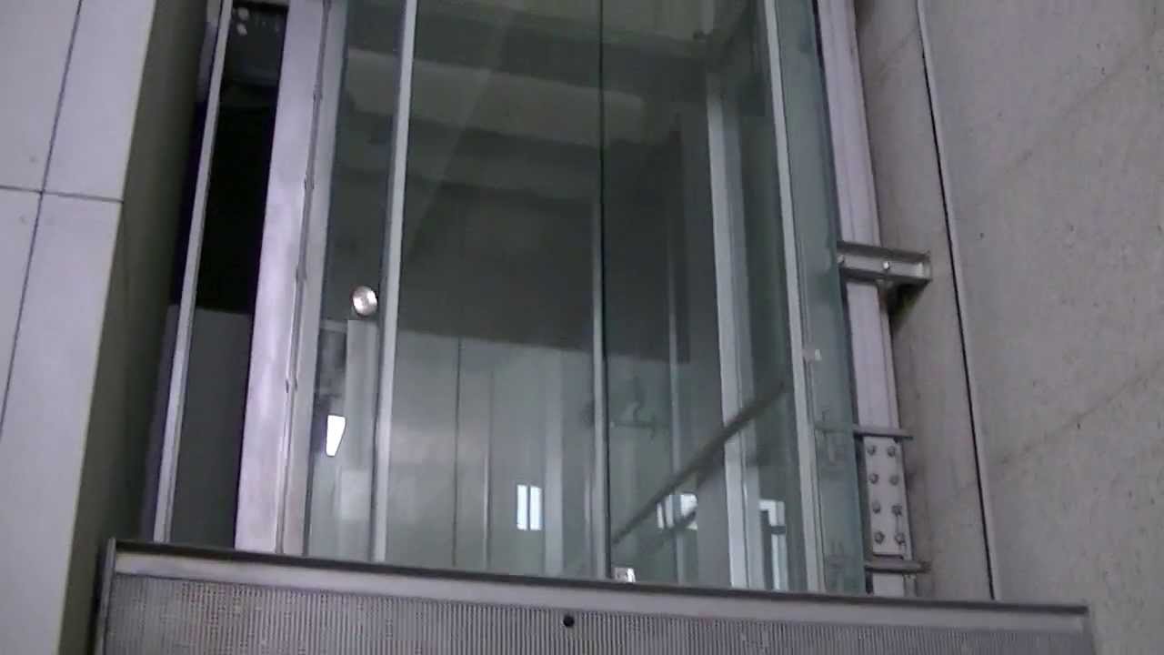 nice Schindler elevator with glass doors - YouTube