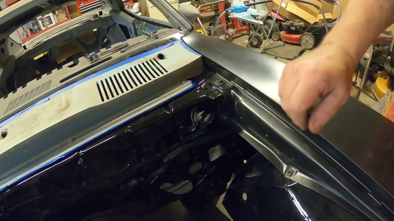 Installing a 69 Firebird cowl panel.. - YouTube