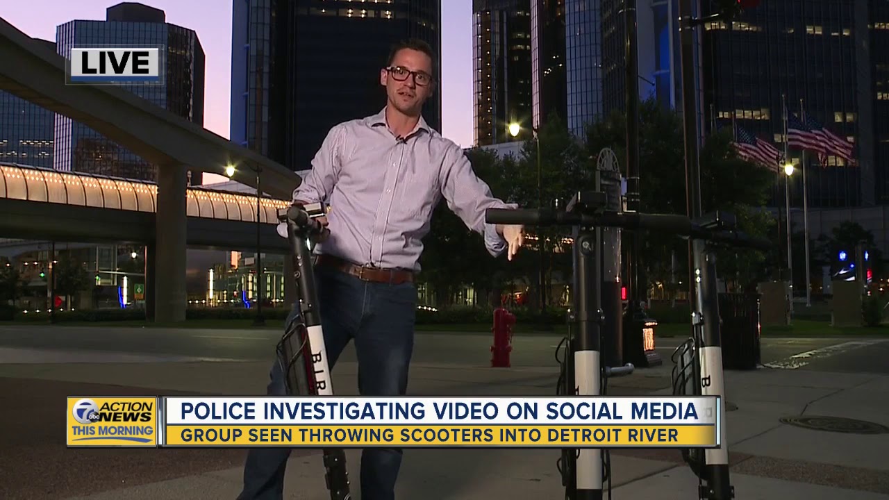 Viral video shows group throwing scooter into Detroit River - YouTube