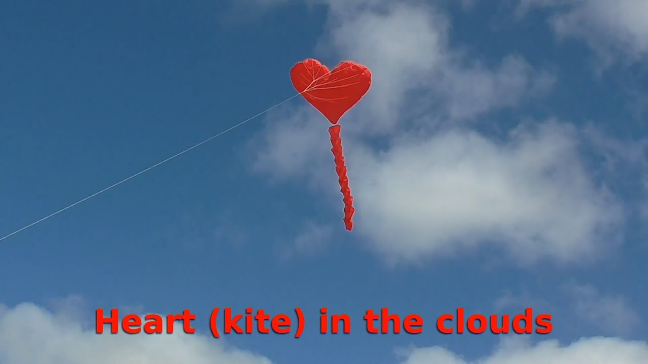 Heart Kite flies in the clouds - YouTube