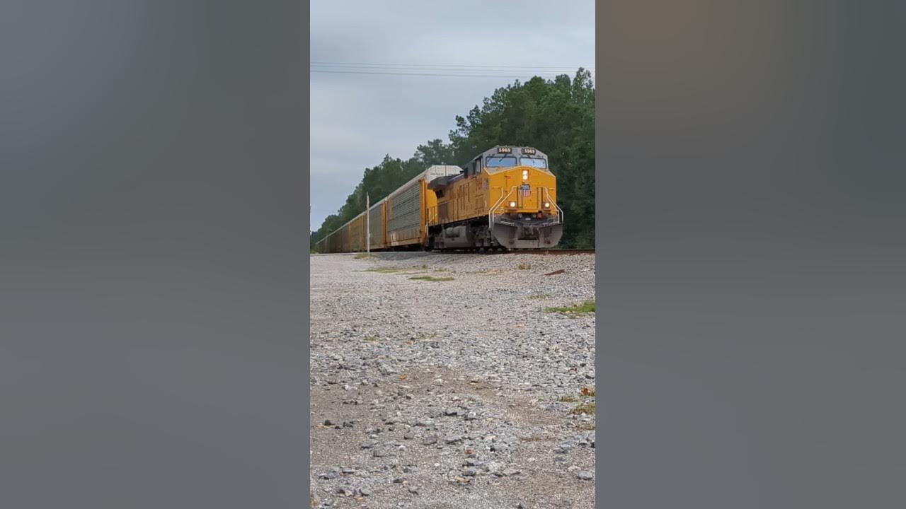 UP #5969 leads a Fast WB Auto train - YouTube