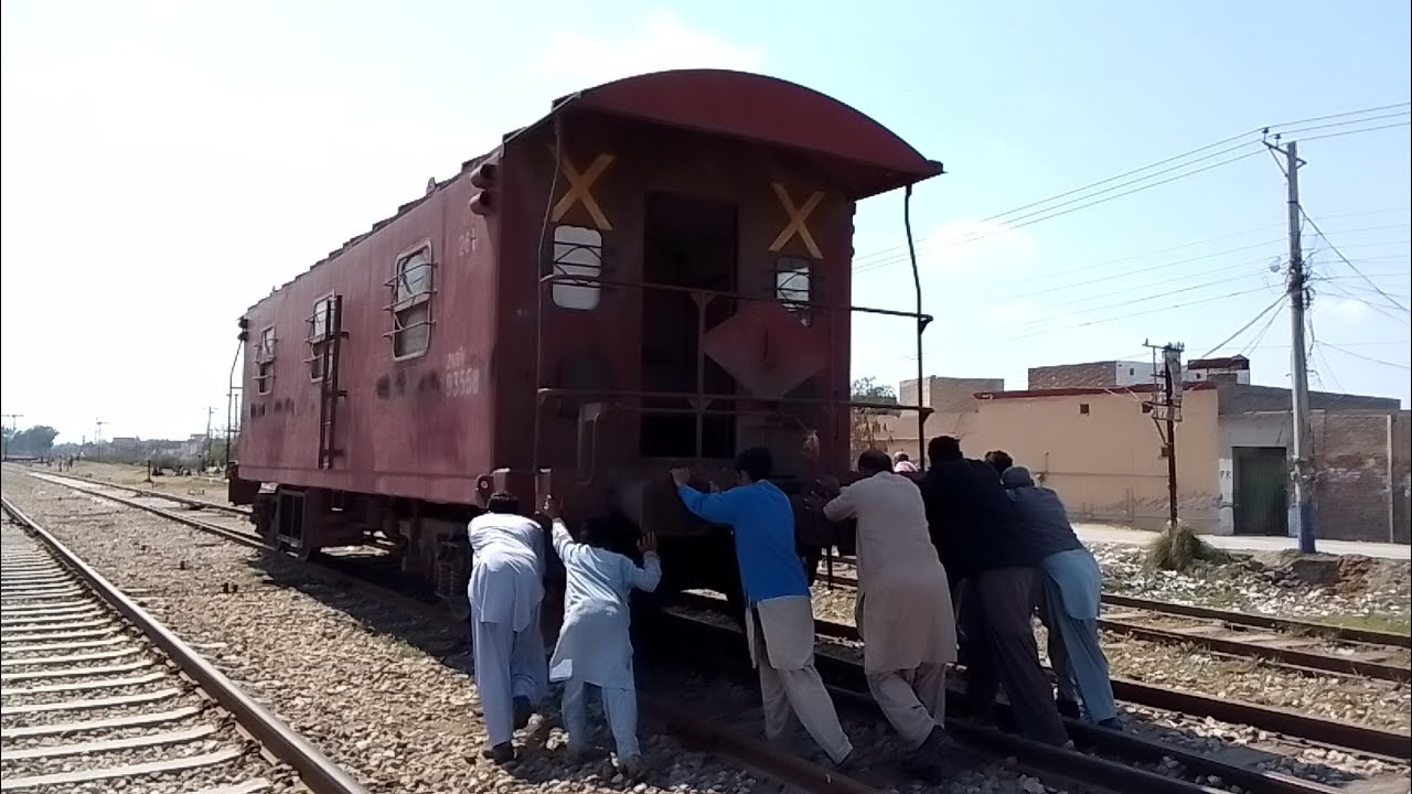 goods train brake van pushed by Railway Workers||railway workers trying ...