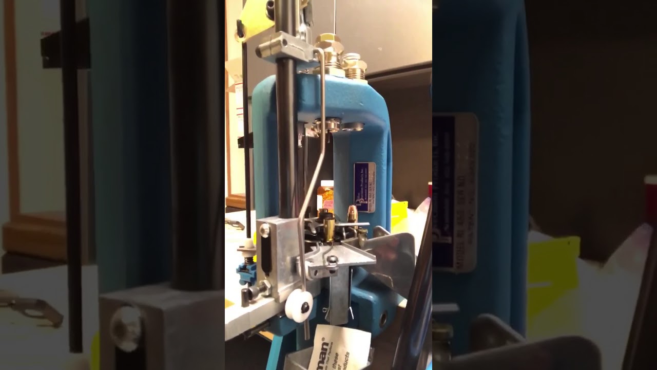 Dillon 450 with Lee bullet feeder adaptor bracket - YouTube