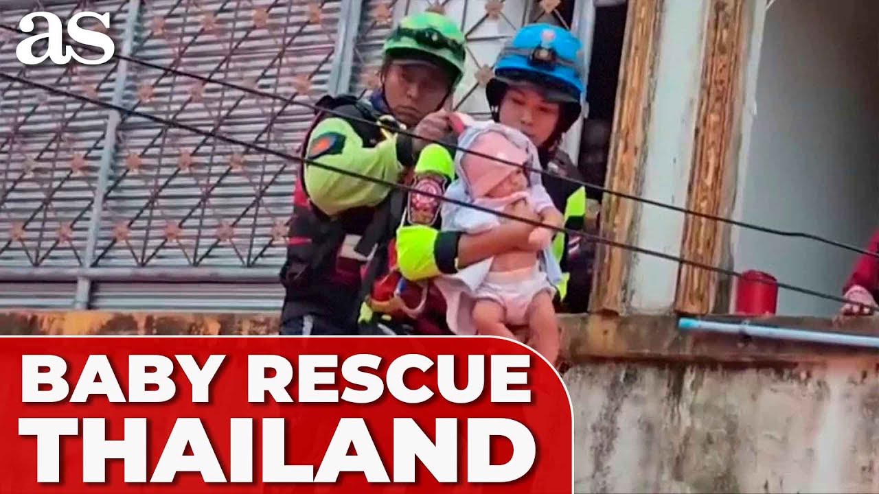 BABY stranded by FLOODING rescued in southern THAILAND - YouTube