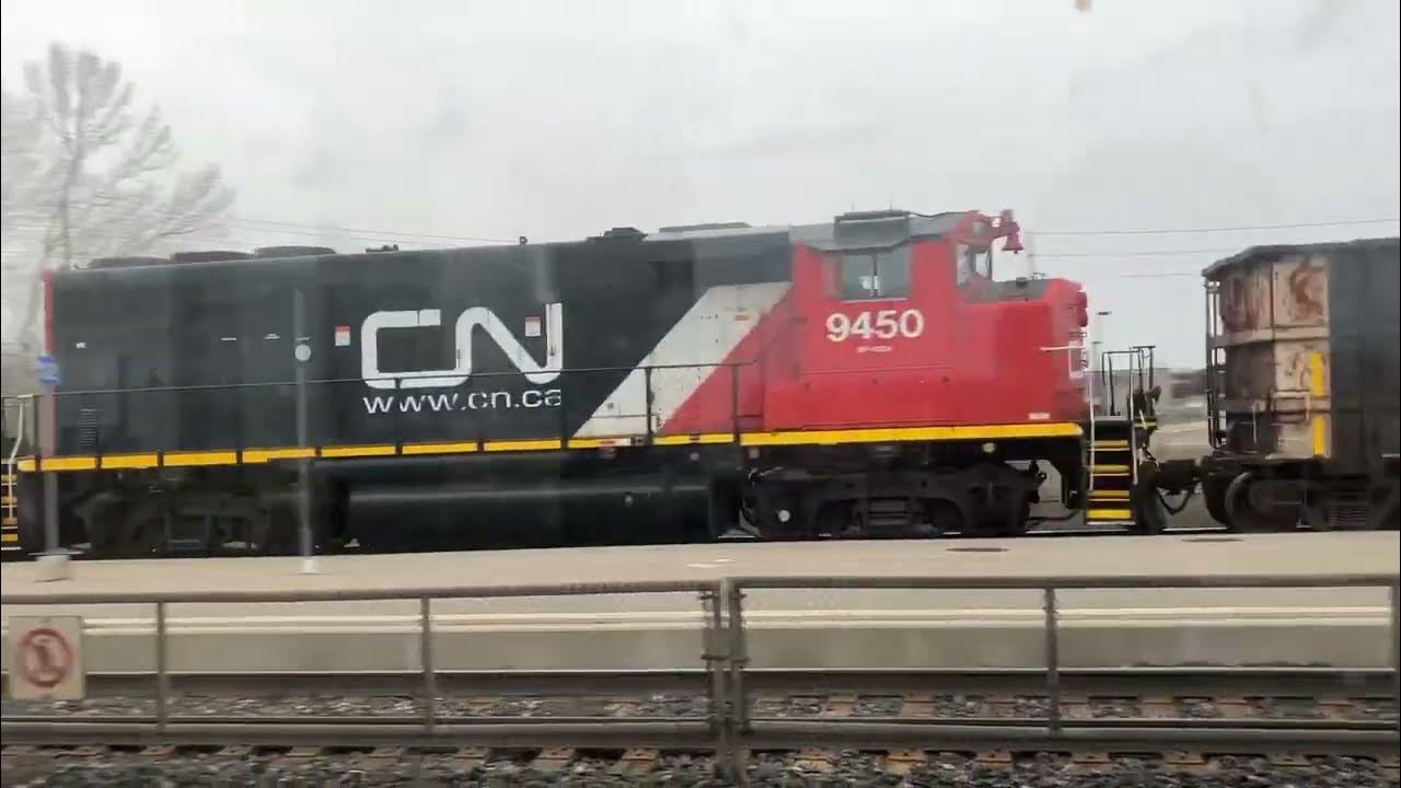 CN 554 EMD GP38-2 7502 & GP40-2 9450 Bronte Go station January 5 2023 - YouTube