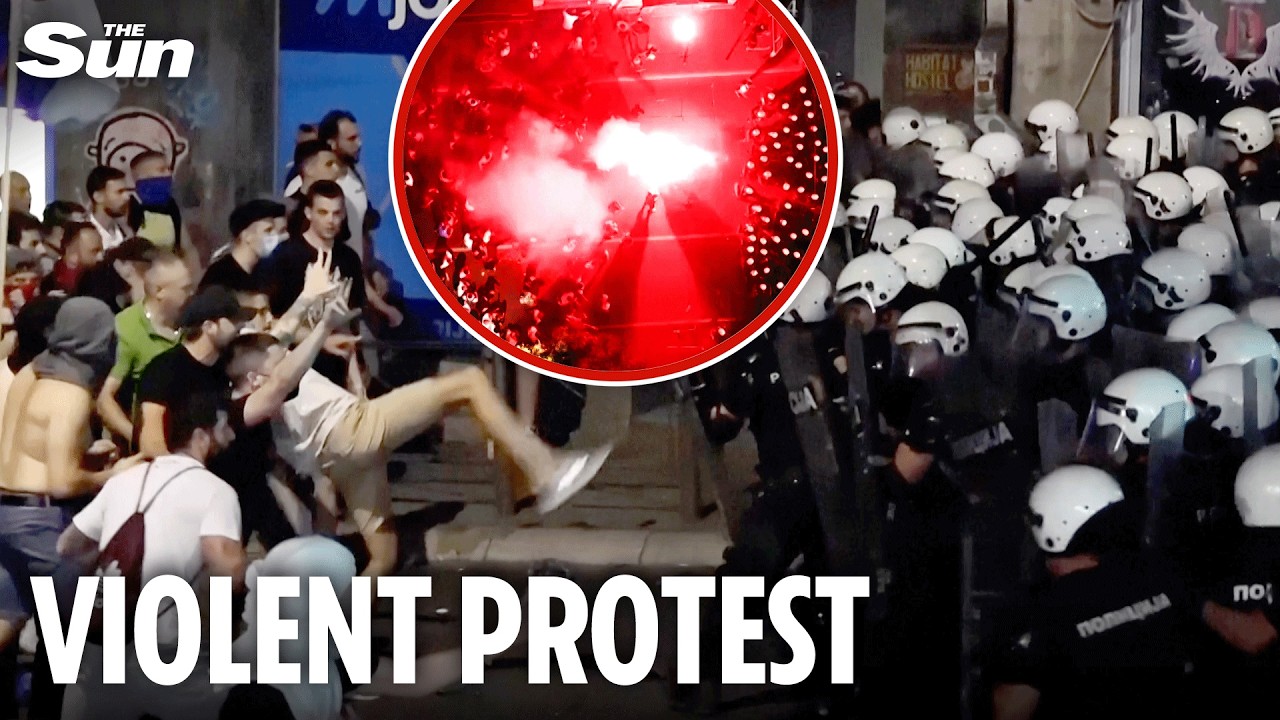 Demonstrators hurl flares at riot police as 140,000 Serbians hit ...
