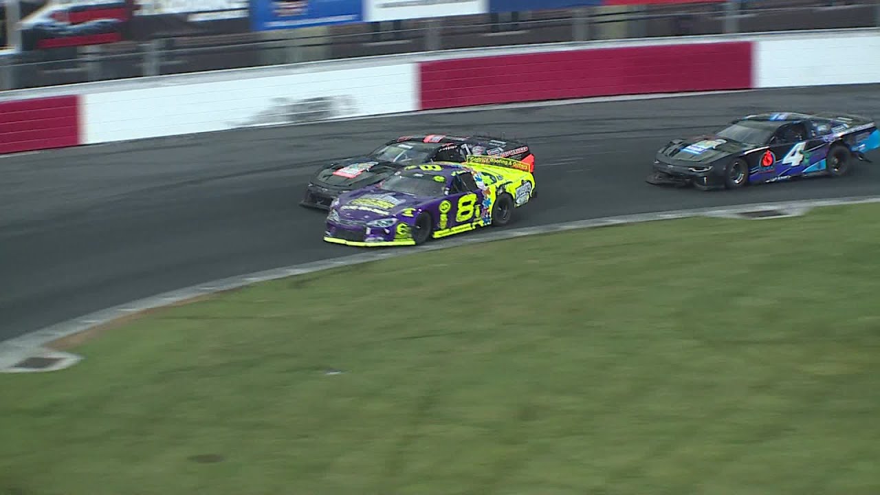 Zack Staley launches flying kick into car at Bowman Gray Stadium stock ...