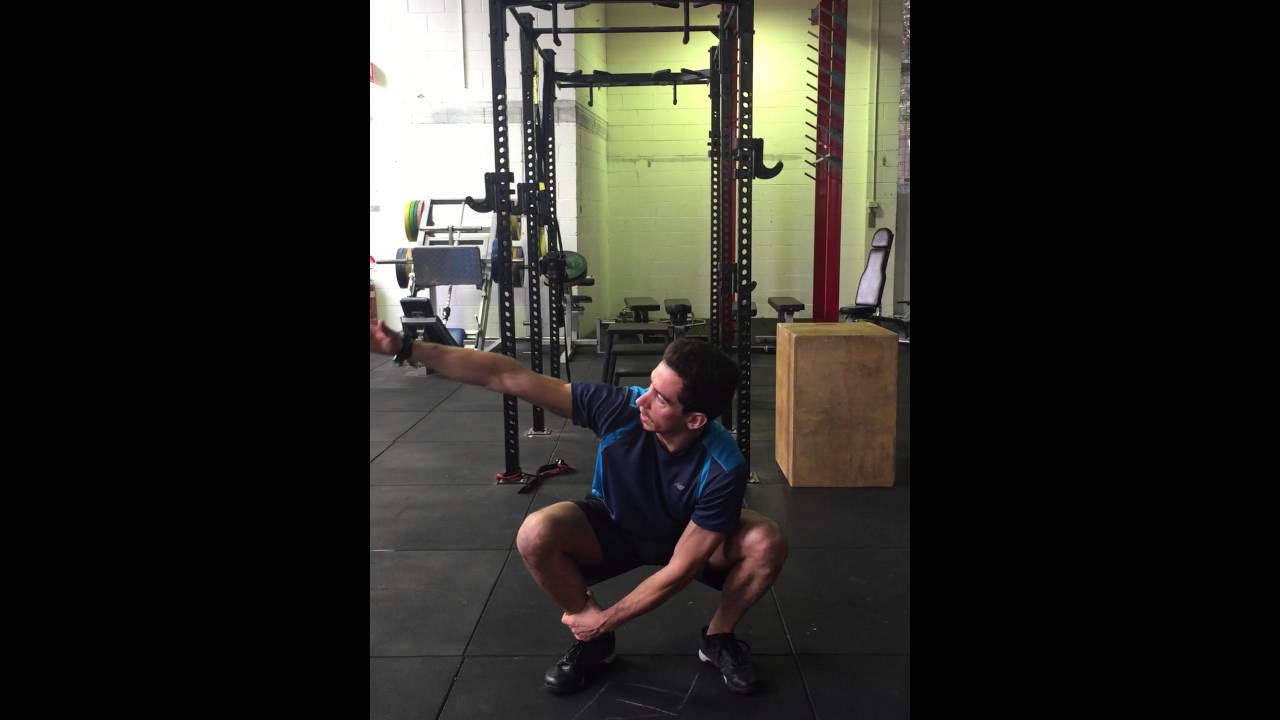 Sit Squat With T Spine Rotation - YouTube