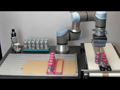 Universal Robots UR5e cobot picking and placing jars - YouTube