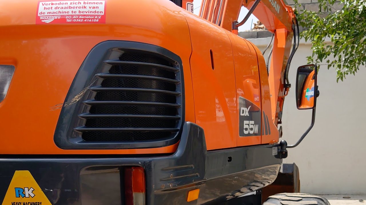 doosan dx 55 working video - YouTube
