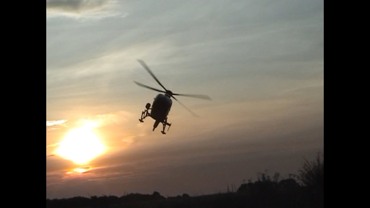 Low flyover and landing of police helicopter EC 135 - thanks to the ...