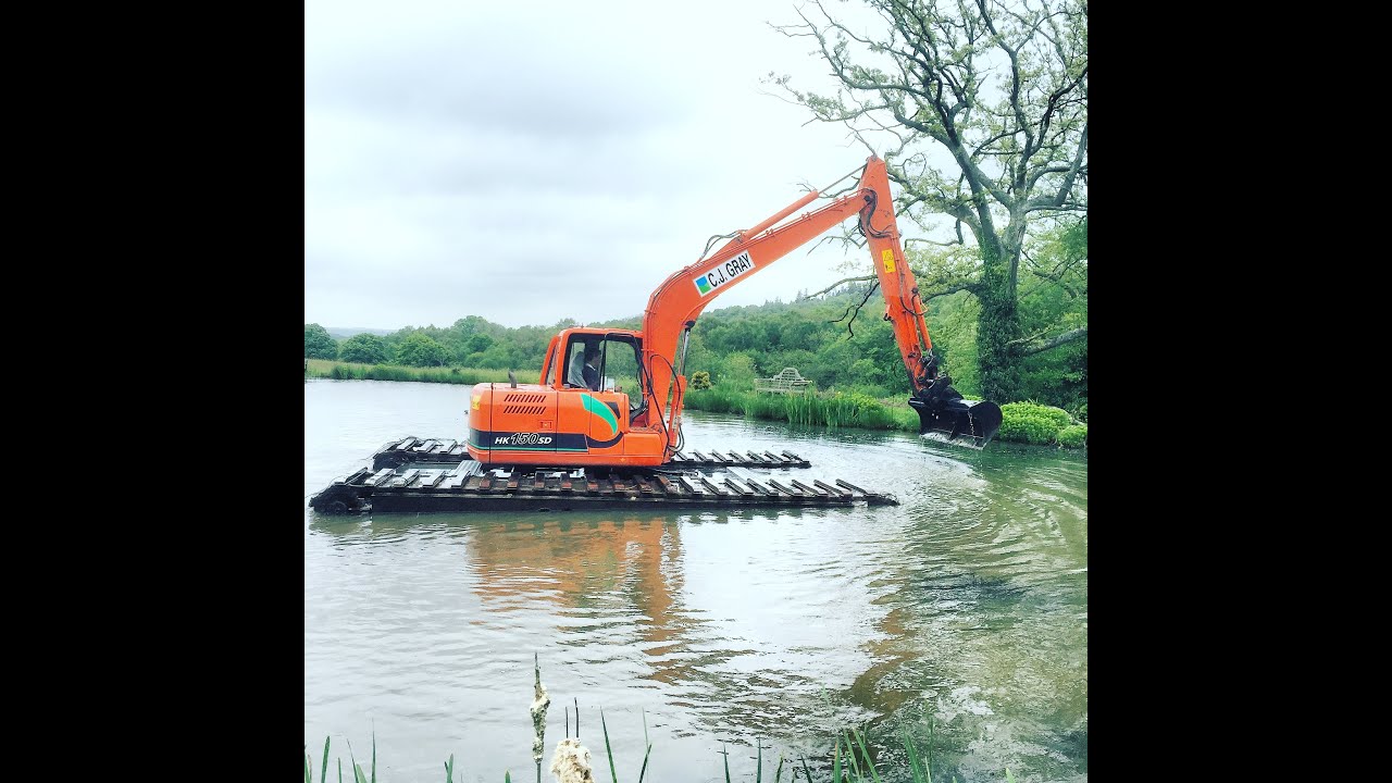 floating digger - YouTube