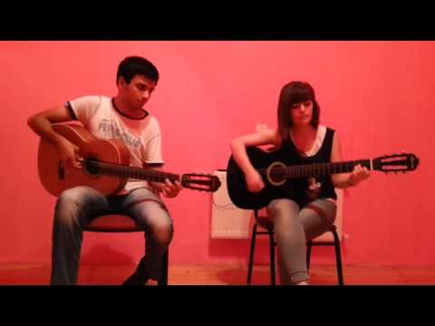 Gitara Kurslari En Guitar Academy Vuqar muellim ve telebesinin gitara ifasinda Caddelerde Ruzgar