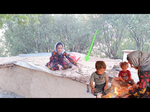 Completing a thatched house: by a nomadic woman and her sons in the mountains